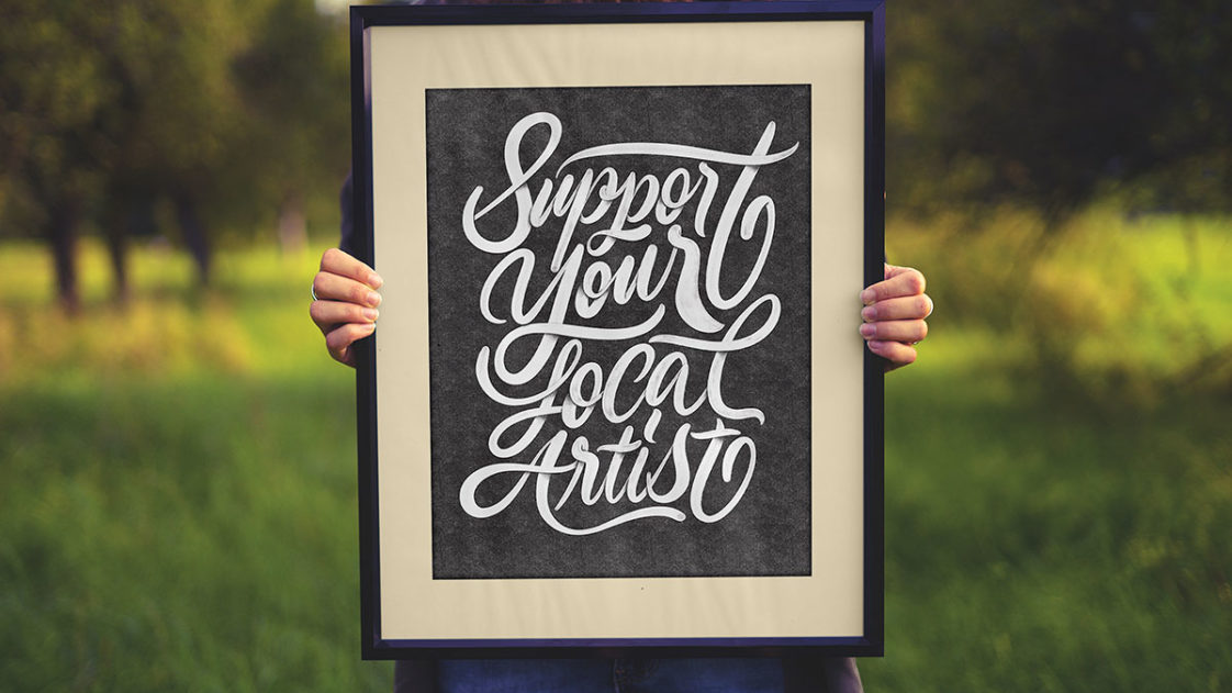 Man Holding Poster / Photo Frame Mockups - PsFiles