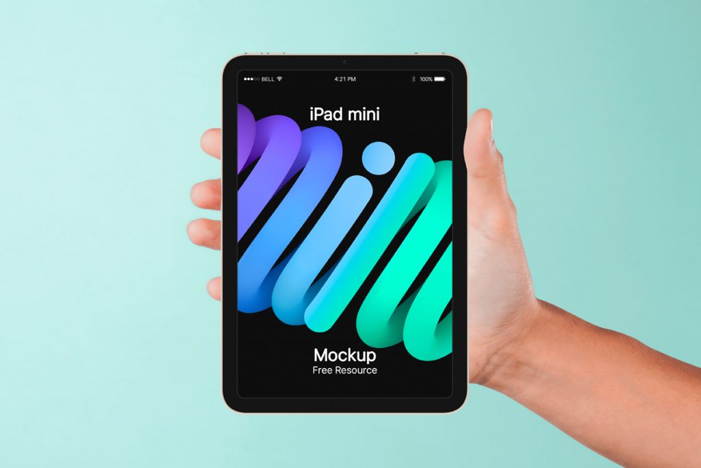 Hand Holding iPad mini Mockup PSD for Free - PsFiles
