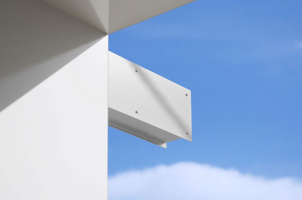 Metal Signage Mockup on Building - PsFiles