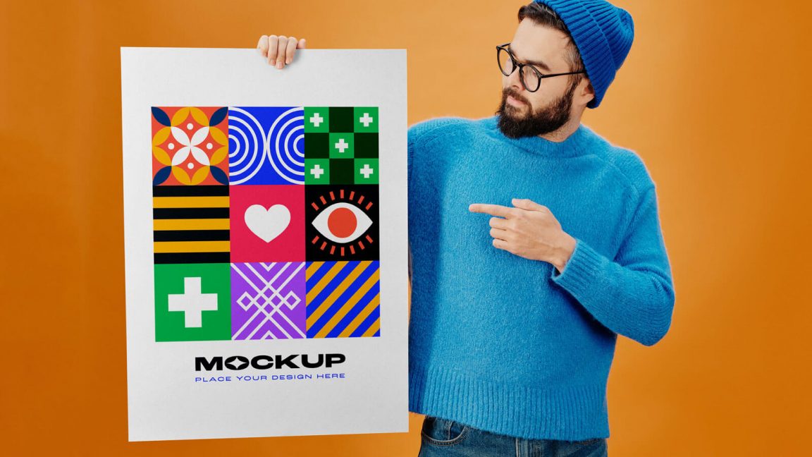 Man Holding Poster / Photo Frame Mockups - PsFiles