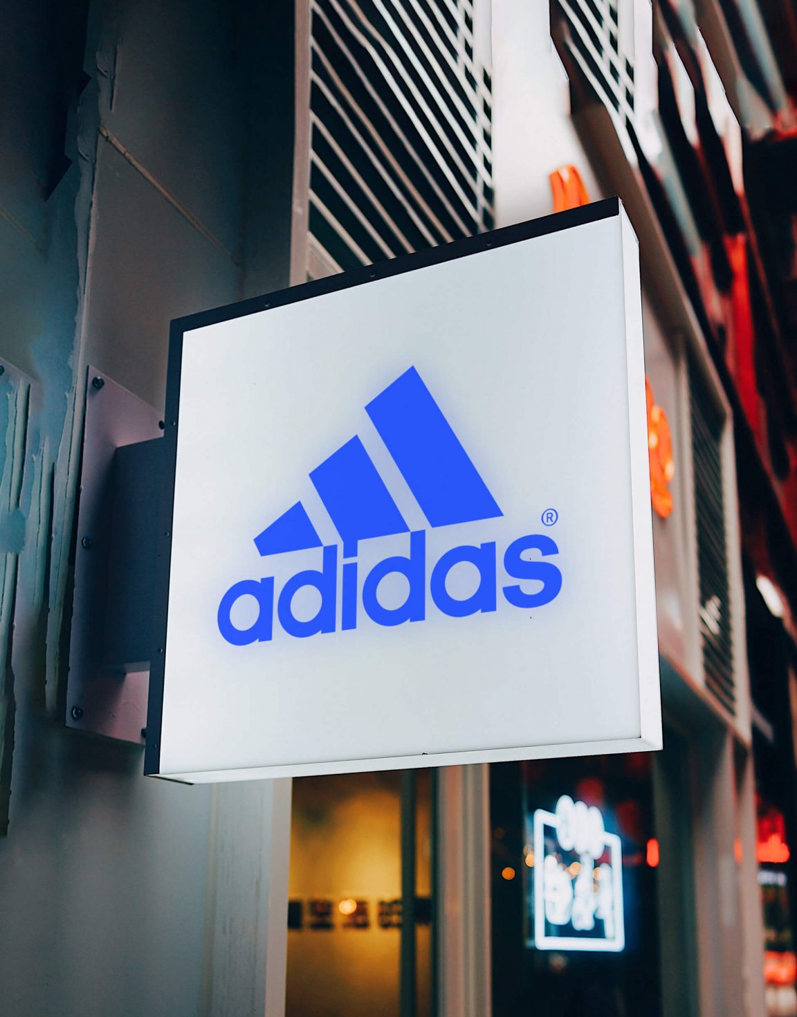 Wall Mounted White Acrylic Logo Signage Board Mockup Free PSD