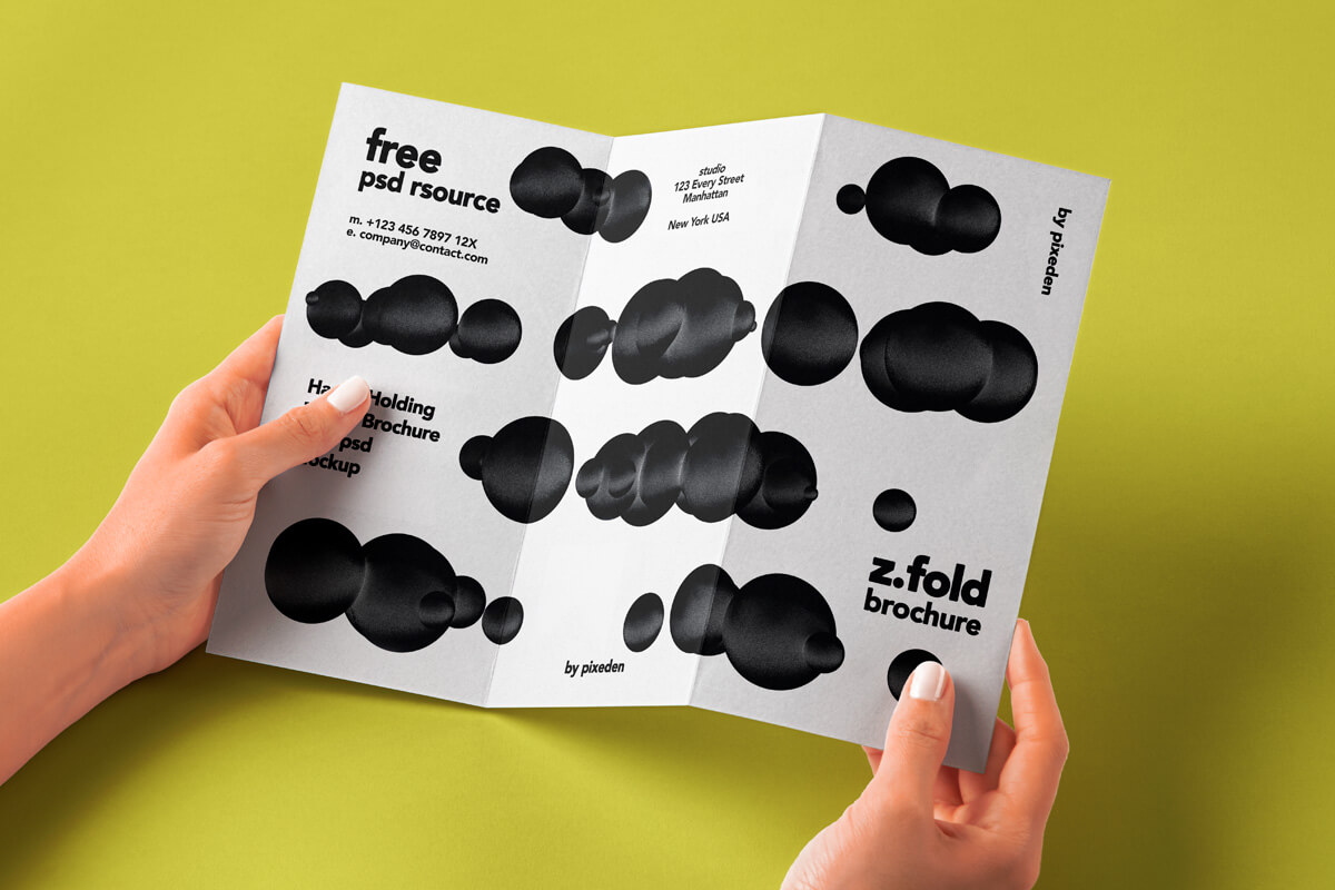 Free Hand Holding Folded Brochure Mockup Free PSD - Free Photoshop Files