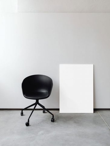 Front View of Canvas Mockup in a Studio - PsFiles