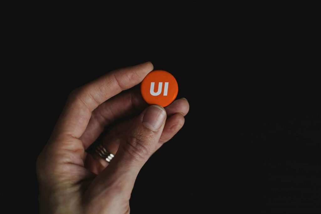 Free Hand Holding Free Pin Button Mockup PSD PSD - PsFiles