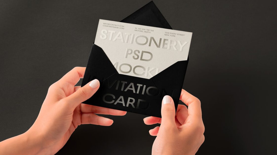 Free Hand Holding Invitation Card Mockup 2 PSD - PsFiles